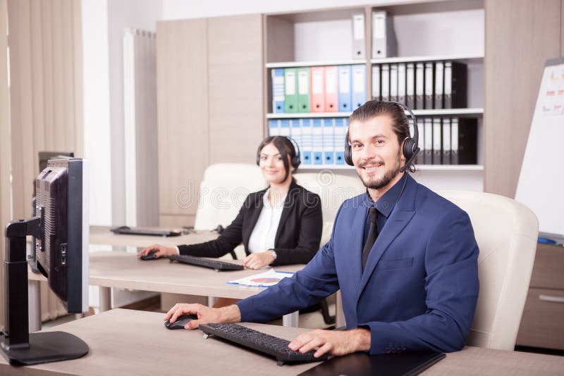 Office of Customer Support Line with People Working in it Stock Image ...