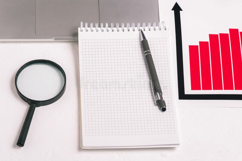 Office Desk with Blank Notepad Page, Graph and Computer. Budget ...