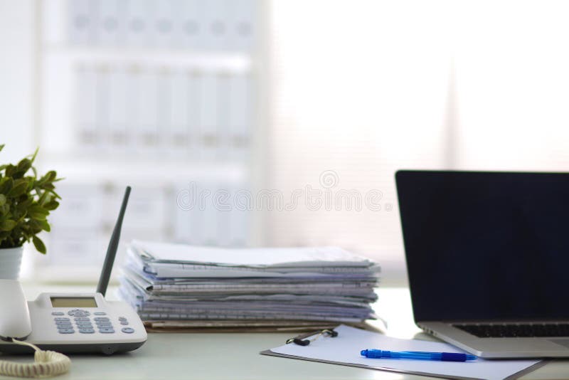Office Desk with a Computer and Stack of Papers Stock Photo - Image of ...
