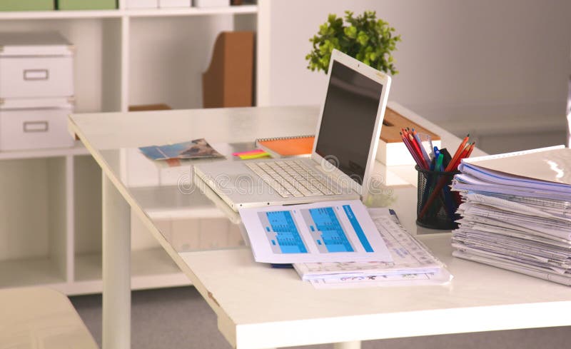 Office Desk with a Computer and Stack of Papers Stock Photo - Image of ...