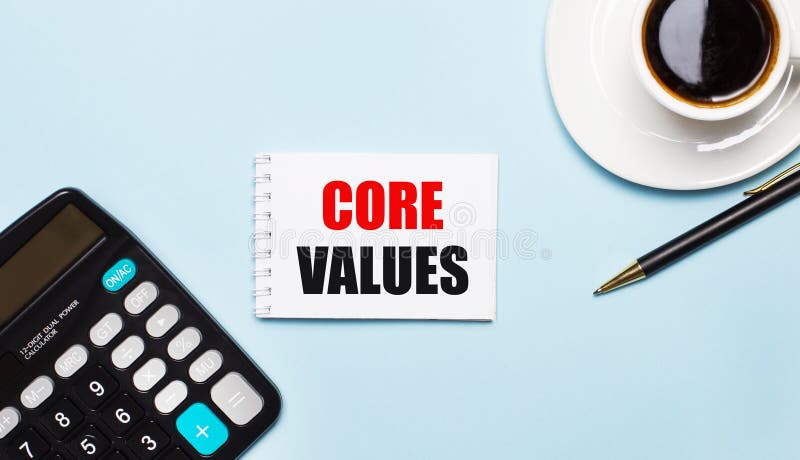 An Office Desk with a Cup of Coffee, a Calculator, a Pen and a Blank ...