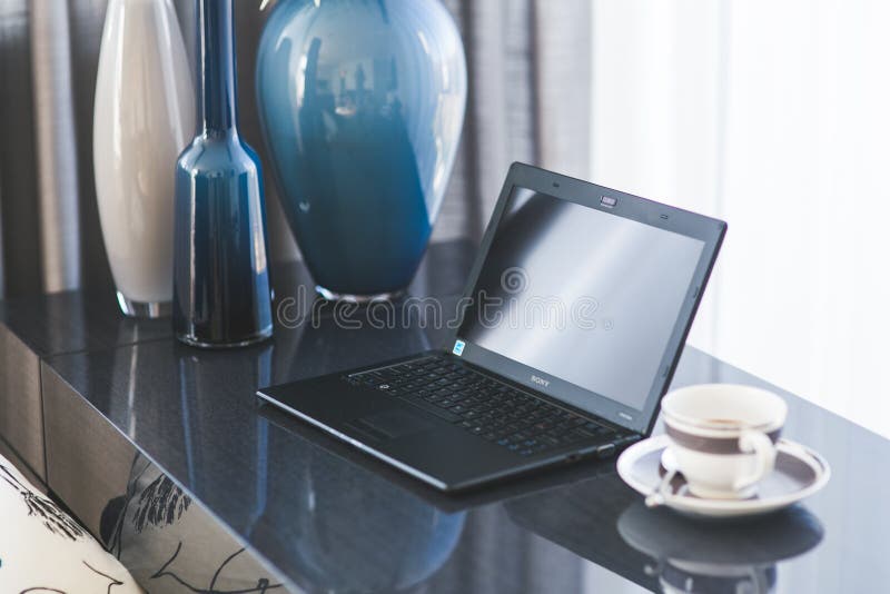 Office desk with laptop stock image. Image of office - 100926223