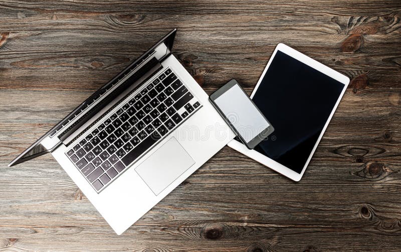 Office Desk with Laptop, Tablet and Phone Stock Image - Image of ...
