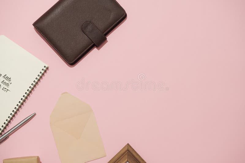 Office Desk with Notebook, Beautiful Bouquet of Roses on Pink Stock ...