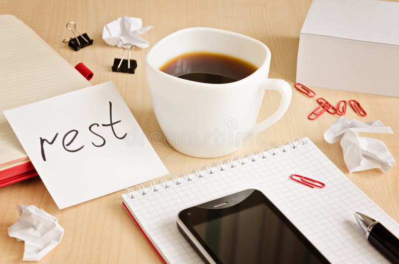Office Desk with Notepads, Phone, Paper for Notes and Cup of Co Stock ...