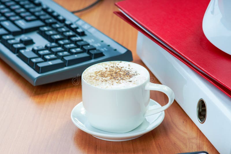 Office Desk Table with Coffee Cup and Work Essential Tools Stock Photo ...