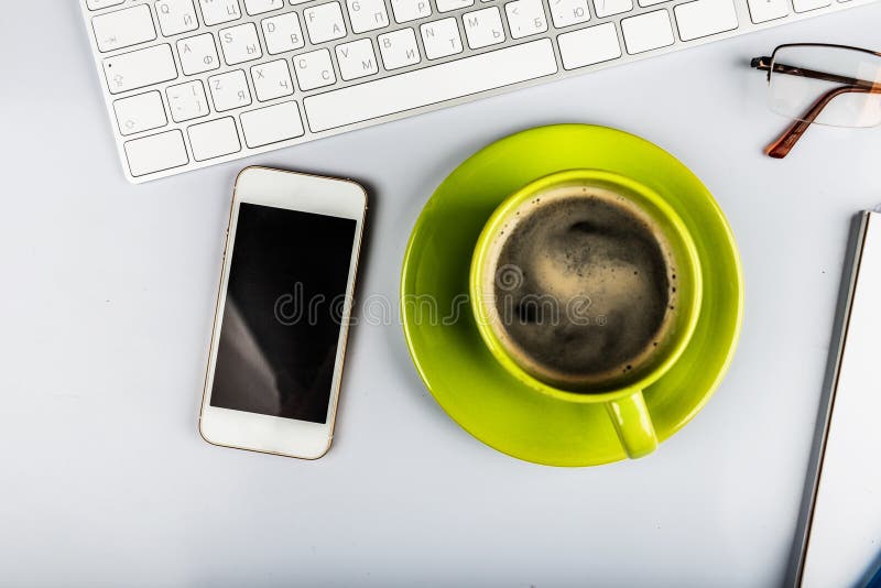 Office Desk Table with Computer Keyboard, Phone and Coffee Cup Stock ...