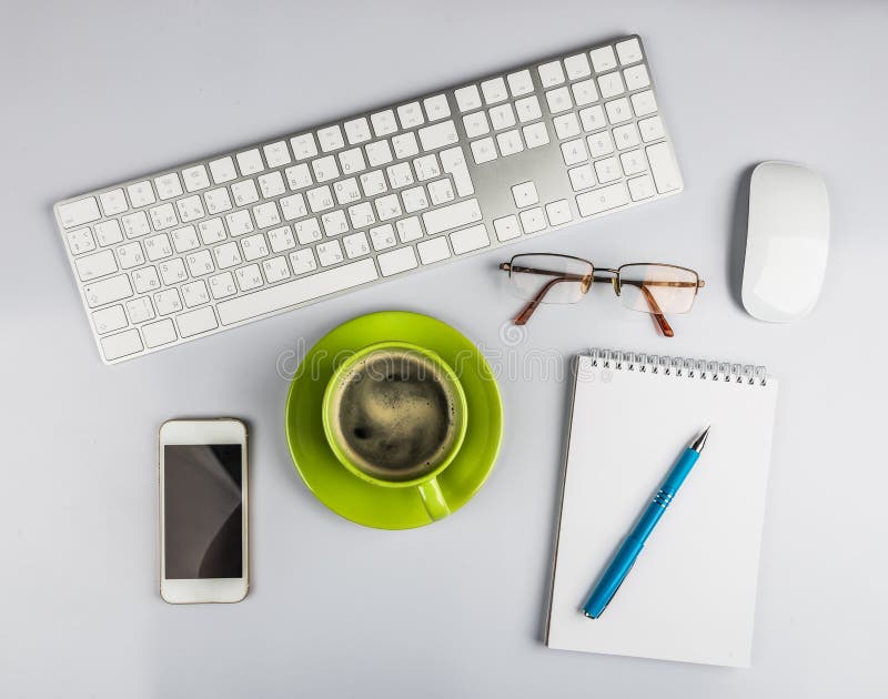 Office Desk Table with Computer Keyboard, Phone and Coffee Cup Stock ...