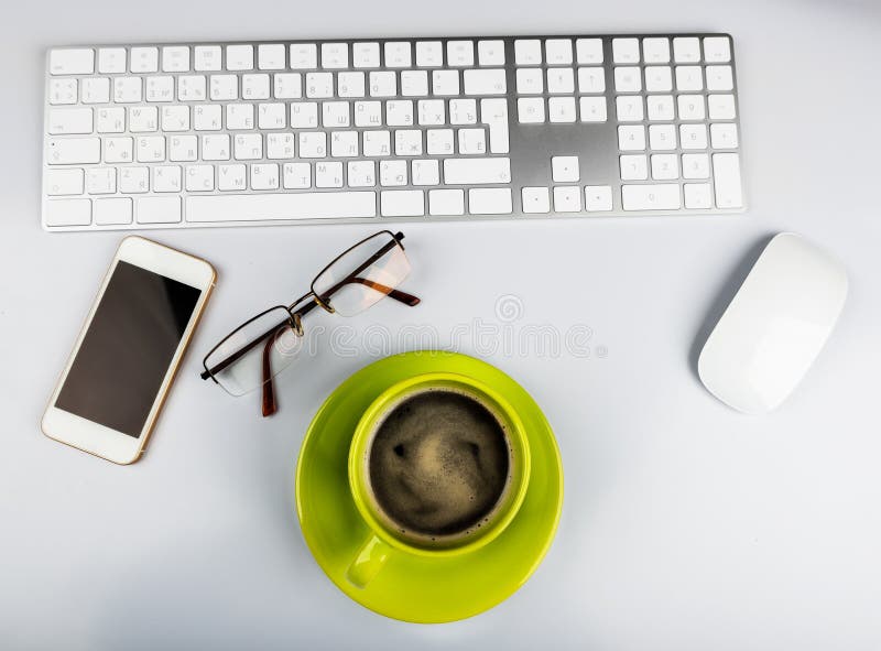 Office Desk Table with Computer Keyboard, Phone and Coffee Cup Stock ...