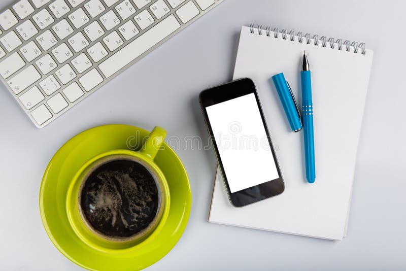 Office Desk Table with Computer Keyboard, Phone and Coffee Cup Stock ...