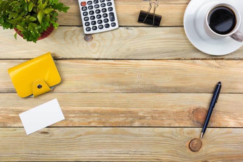 Office Desk Table with Computer, Pen and a Cup of Coffee, Lot of Things ...