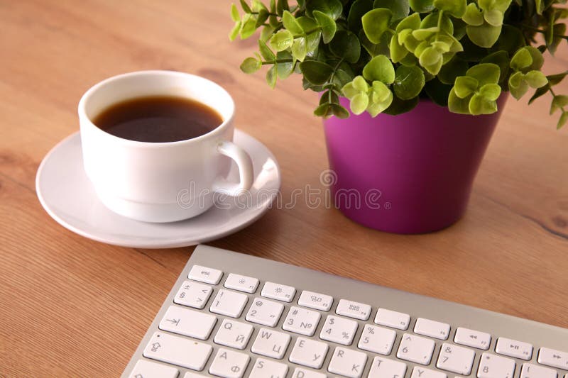 Office Desk Table with Computer, Supplies and Coffee Cup Stock Photo ...