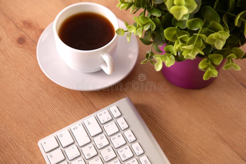 Office Desk Table with Computer, Supplies and Coffee Cup Stock Photo ...