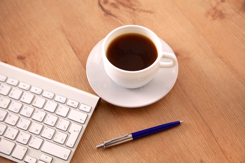 Office Desk Table with Computer, Supplies and Coffee Cup Stock Image ...