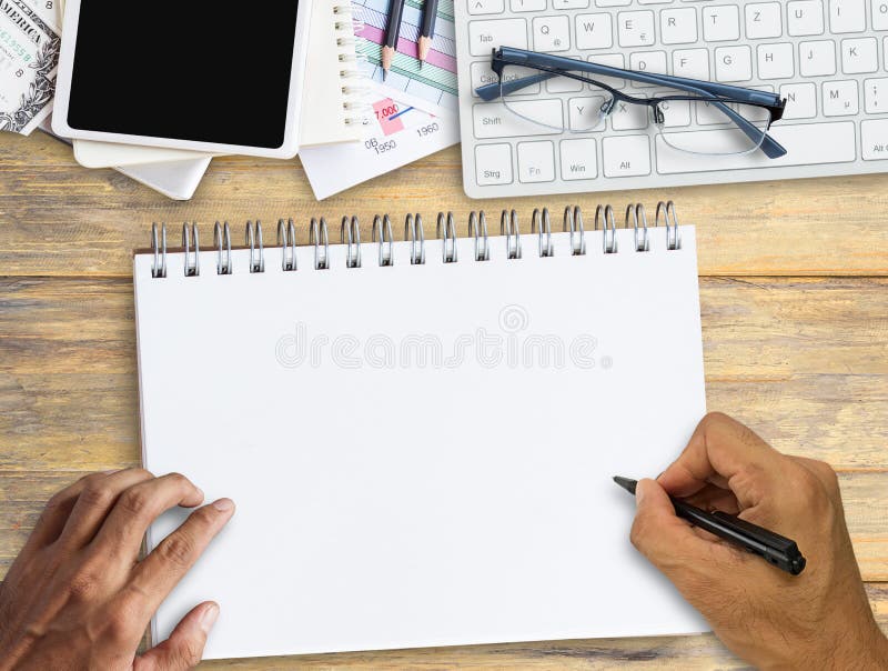 Office Desk Table with Hand Writing on Notebook Stock Image - Image of ...