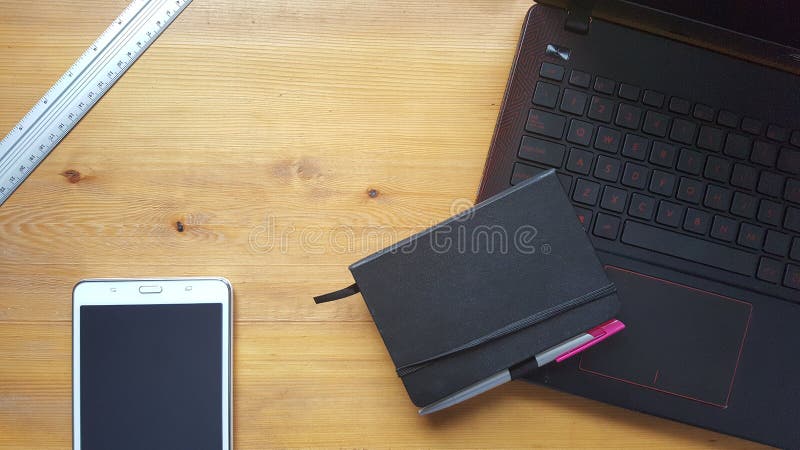 Office Desk Table with Laptop, Ruler and Notebook Stock Image - Image ...