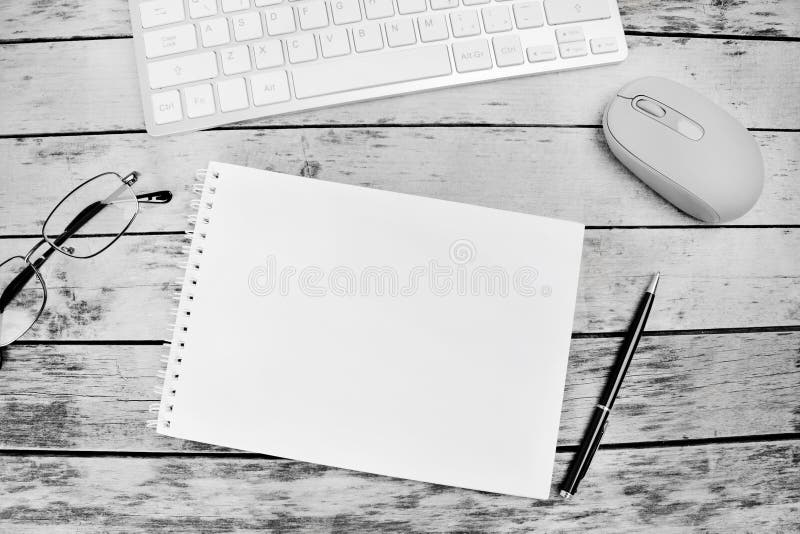 Office Desk Table with Notepad, Computer Keyboard and Pen Stock Photo ...