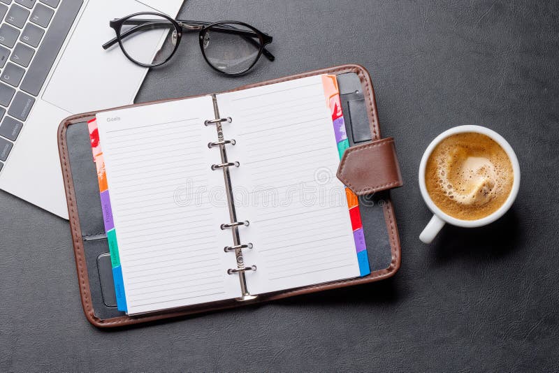 Office Desk Table with Notepad, Cup of Coffee and Supplies Stock Photo ...