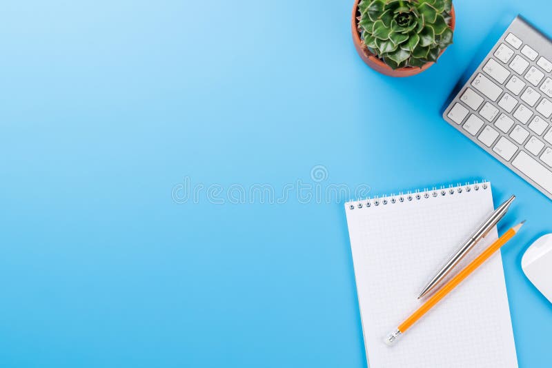 Office Desk Table with Notepad, Plant and Supplies Stock Image - Image ...