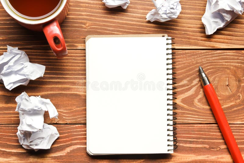 Office Desk Table with Supplies and Crumled Paper. Top View Stock Image ...