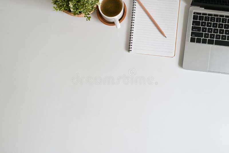 Office Desk Top View Laptop Computer, Coffee, Notebook Paper and Pencil ...