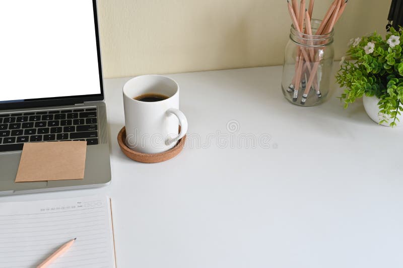 Office Desk Top View Laptop Computer, Coffee, Notebook Paper and Pencil ...
