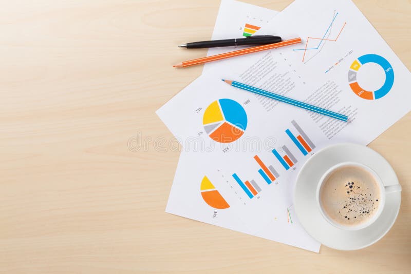 Office Desk Workplace with Coffee and Charts Stock Photo - Image of ...