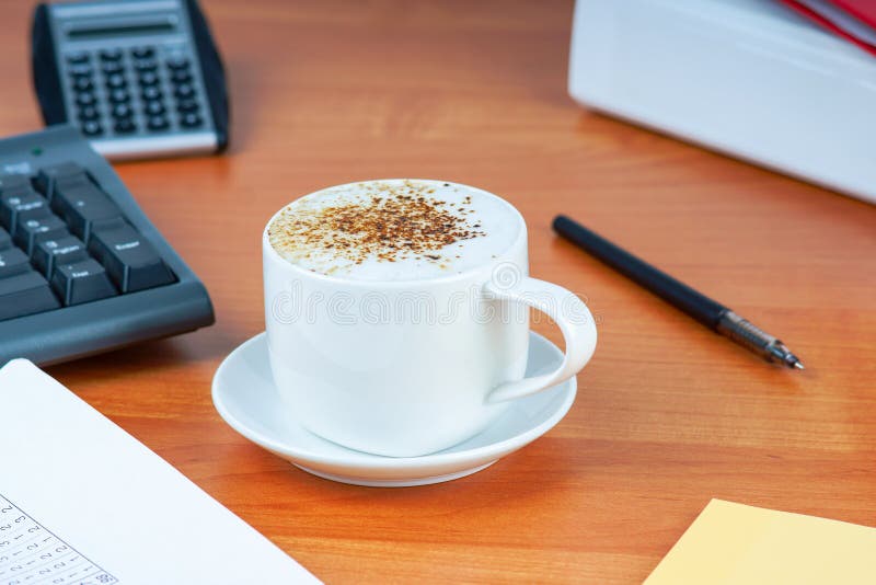 Office Desktop with Coffee Cup and Work Essential Tools Stock Photo ...