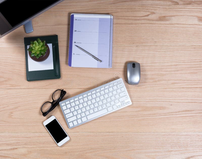 Office Desktop with Simple Work Items in Overhead View on Red Oak Wood ...
