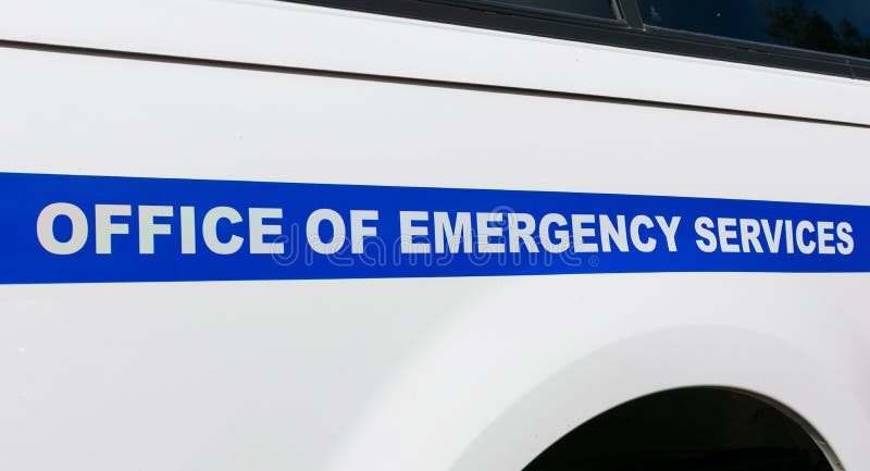 Office of Emergency Services Text on the Side of White Emergency ...