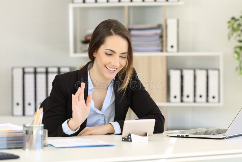 Office Employee Having a Video Call with a Smart Phone Stock Photo ...