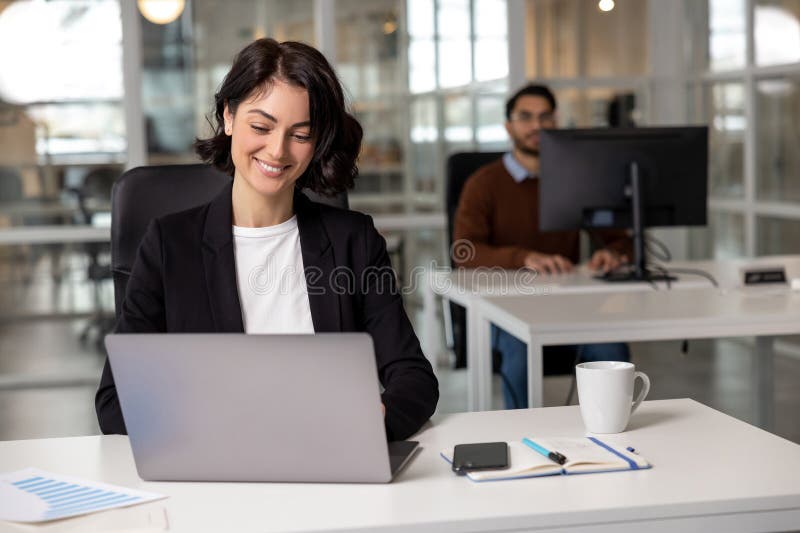 Office Employee Working on Computer in Modern Coworking Environment ...