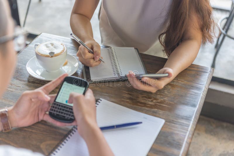 Office Employee Working on Phone and Writing Notes Stock Image - Image ...