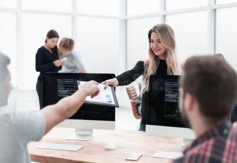 Office Employees Analyzing the Information Received in the Office Stock ...