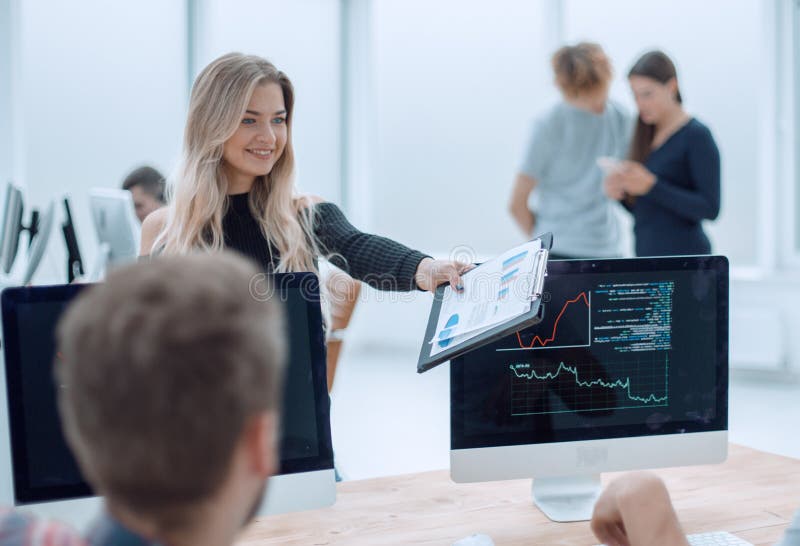 Office Employees Analyzing the Information Received in the Office Stock ...