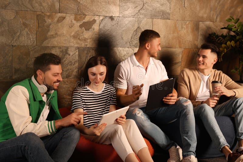 Office Employees Enjoying Break Together in Recreation Room at Work ...