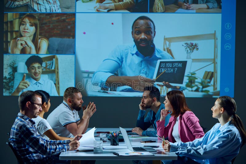 Office Employees Gather in the Conference Room, Having Online Video ...