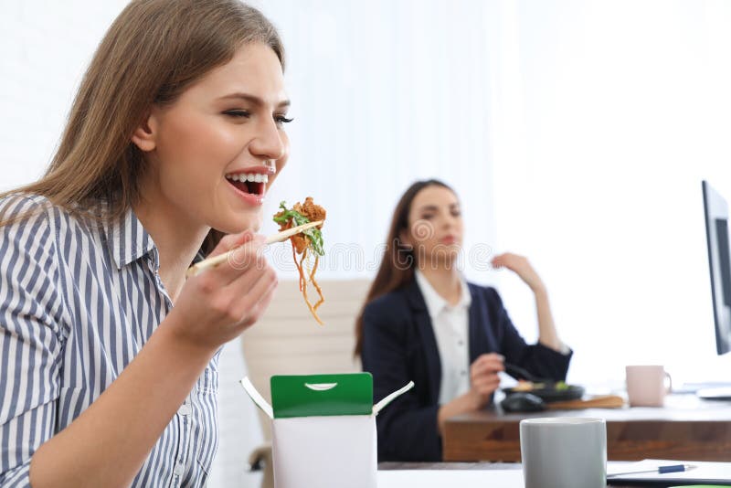Office Employees Having Lunch at Workplace Stock Image - Image of fresh ...