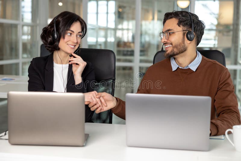 Office Employees in Headset Using Laptop for Work in Coworking Space ...