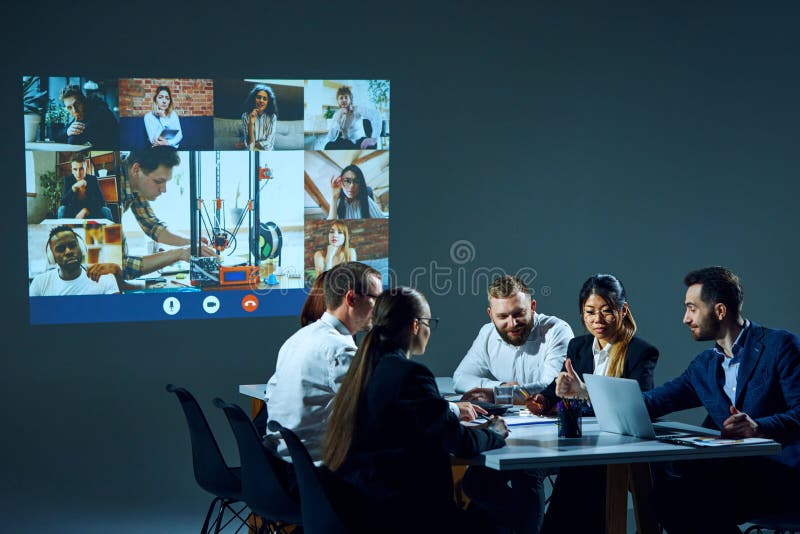 Office Employees Join a Video Call from the Boardroom, Discussing ...