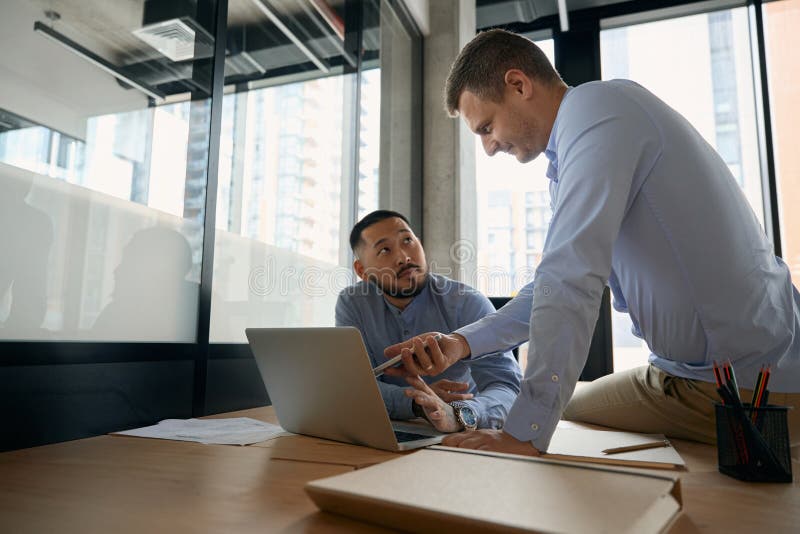 Office Employees Sending Data from Mobile Device To Portable Computer ...