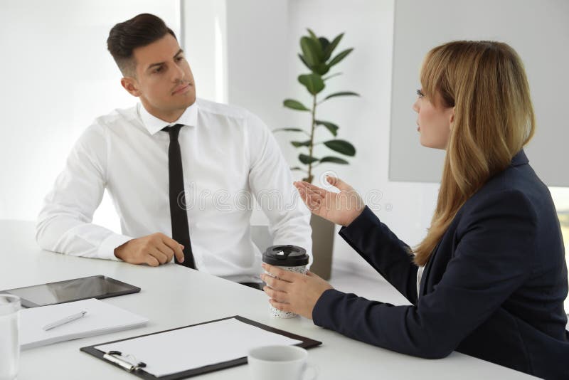 Office Employees Talking at Table during Meeting Stock Image - Image of ...