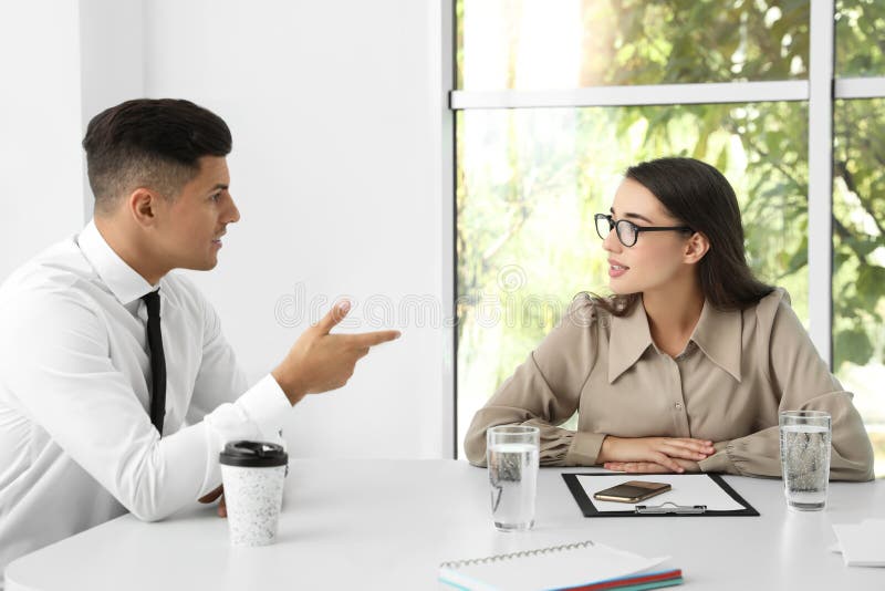 Office Employees Talking at Table during Meeting Stock Image - Image of ...
