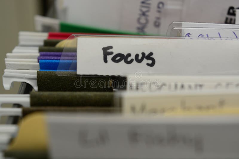 Office Files and Documents in the Cabinet Labeled As "focus" Stock ...