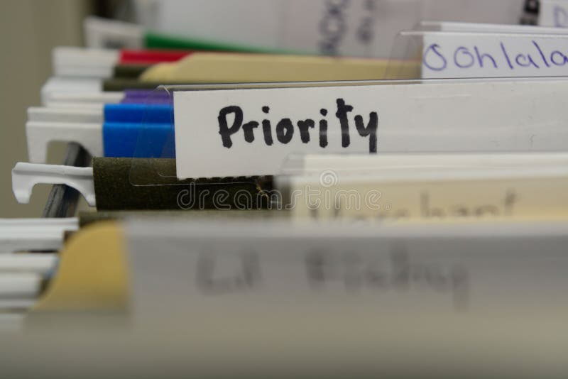 Office Files and Documents in the Cabinet Labeled As "priority" Stock ...