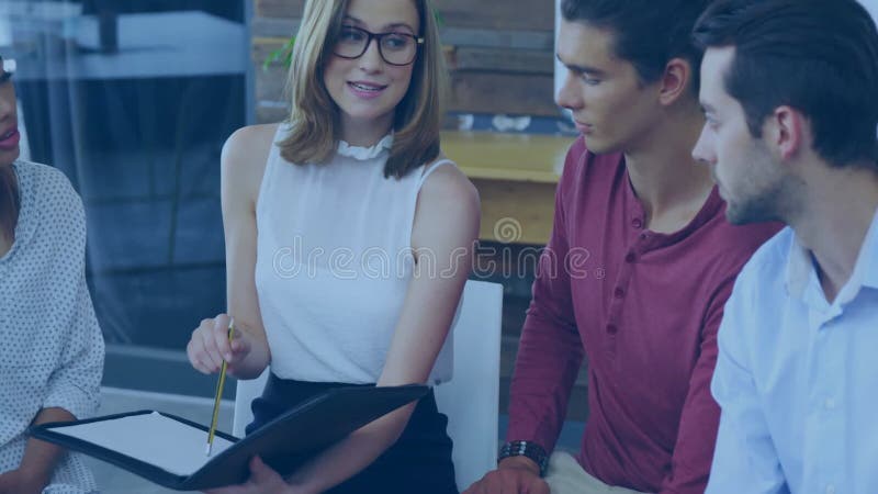 In Office, Group of Professionals Discussing Work while Watching ...