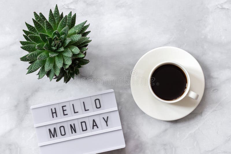 Office or Home Table Desk. Lightbox Text Hello Monday, Cup of Coffee ...