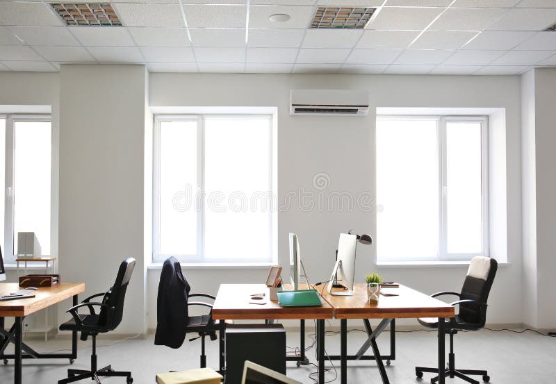 Office Interior with Tables and Armchairs. Workplace Design Stock Photo ...