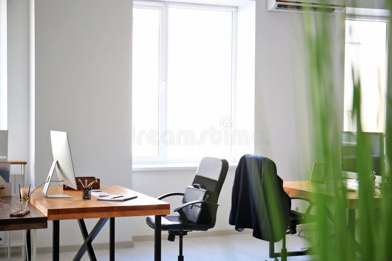 Office Interior with Tables and Armchairs. Workplace Design Stock Image ...