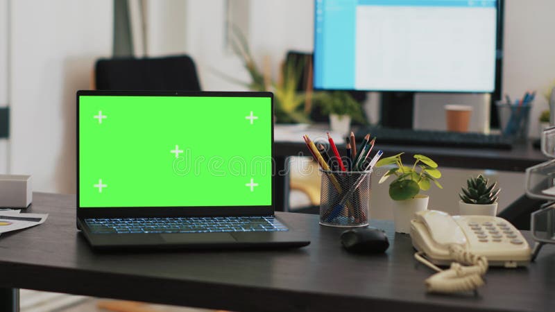 Office with Chroma Key Notebook and Display with Scheduled Clients List ...